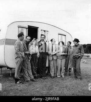 Costume and Set Designer ROGER FURSE and Art Director CARMEN DILLON on set candid during filming ...