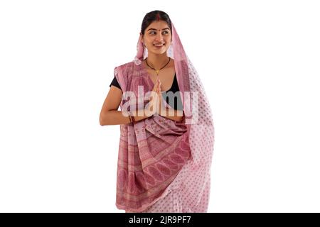 Portrait of Bihar woman greeting against white background Stock Photo ...