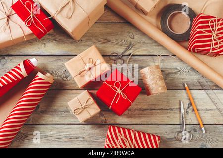 Boxes in craft paper, eco paper on the wooden table Stock Photo - Alamy