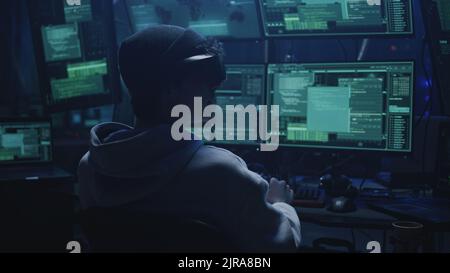 Cybercriminal in virtual reality glasses hacking and launching a ...