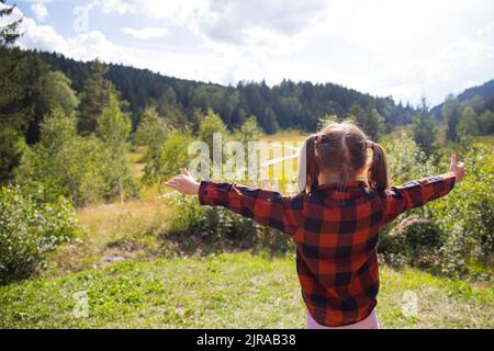 Girl with red pigtails in the park in summer. High quality photo Stock ...