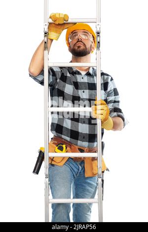 male builder in helmet climbing up ladder Stock Photo - Alamy