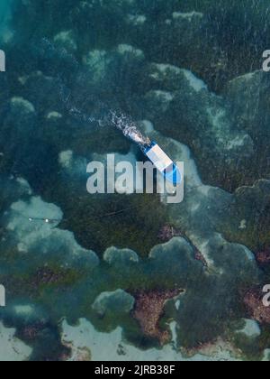 Maldives, Kaafu Atoll, Himmafushi, Aerial view of small construction ...
