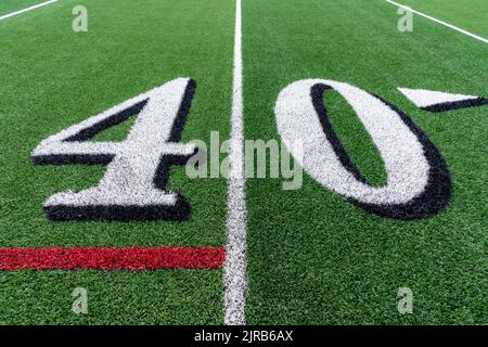 Synthetic turf slanted football 40 yard line in white with black number ...
