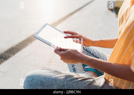 Businesswoman touching screen of tablet PC Stock Photo - Alamy