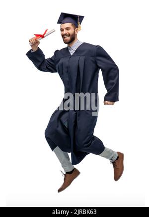 University student jumping with his graduation diploma Stock Photo - Alamy