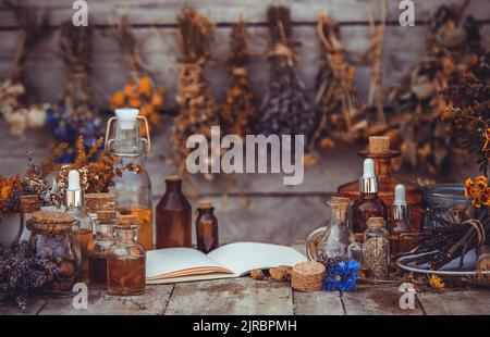 Medicinal herbs and tinctures homeopathy. Selective focus Stock Photo ...