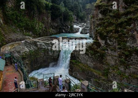Visitors explore the Aharbal waterfall, also known as "Niagara ...
