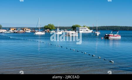 The Clear Lake marina and beach at Wasagaming, Riding Mountain National ...