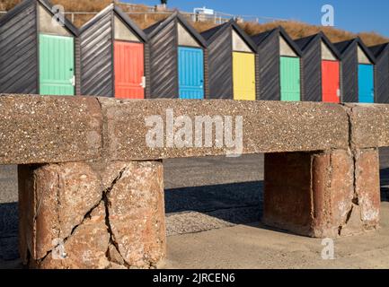 Colourful beach huts on Lowestoft promenade. Captured on a bright and ...