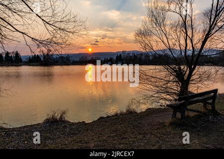 The fishing pond Badinsky Rybnik during sunset in the central Slovakia ...