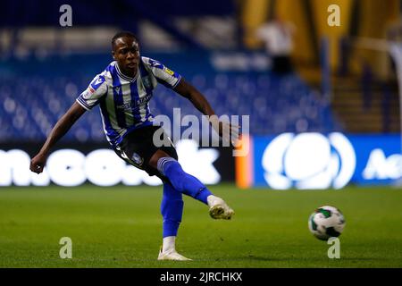 Dennis Adeniran #8 of Sheffield Wednesday heads the ball goalwards ...