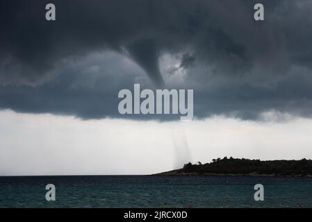 Water Spout typhoon over Halkidiki in greece. Dark stormy clouds Stock ...