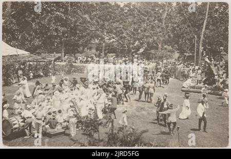 Cook Islanders dressed in white and in military uniforms performing ...