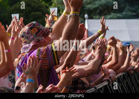 Fans cheering Scouting for Girl who are performing on main stage at ...