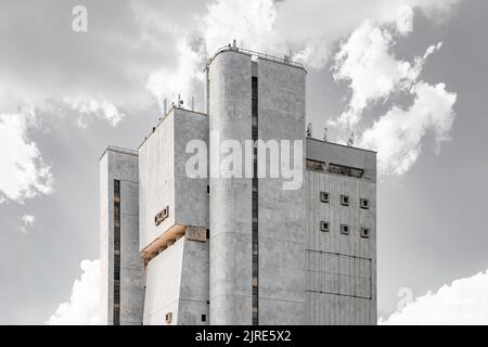 Soviet Brutalist Architecture. High gray walls with small windows. Old ...