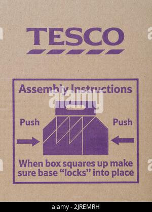 Close up of side of Tesco cardboard wine bottle carrier with guidelines ...