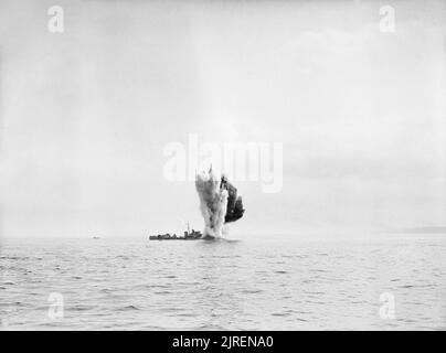 WW2: After the raid on Dieppe, tanks and landing craft on the beach ...