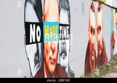 Adolf Hitler, Vladimir Putin and Joseph Stalin on anti-war mural ...