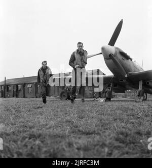 American volunteer pilots of No.121 (Eagle) Sqaudron playing poker in ...