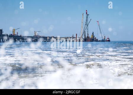 Wilhelmshaven, Germany. 24th Aug, 2022. Construction work is taking ...