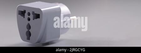 Universal white plugs adapter, adapter to put in sockets Stock Photo ...
