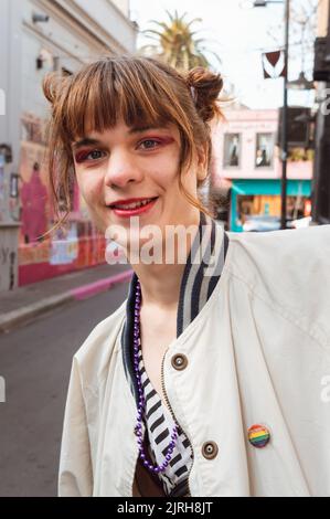 Portrait of a happy,smiling trans,transexual Filipina woman,sitting on ...