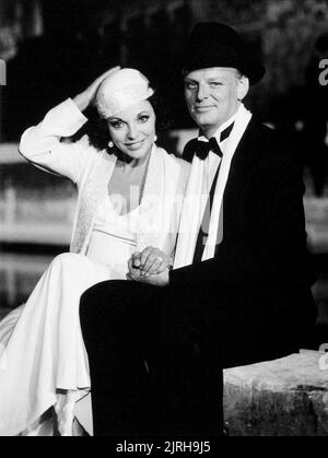 JOAN COLLINS, PETER HOLM, MONTE CARLO, 1986 Stock Photo - Alamy