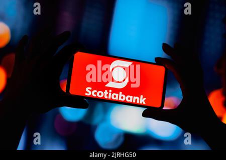 In this photo illustration, the logo of Scotiabank is displayed on the ...