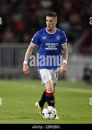 EINDHOVEN, NETHERLANDS - AUGUST 24: Ryan Kent of Rangers is challenged ...