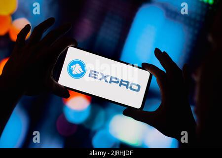 In this photo illustration, the Expro logo is displayed on a smartphone ...