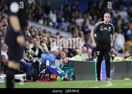 Michael Duff Head coach of Barnsley walks towards the dugout Stock ...
