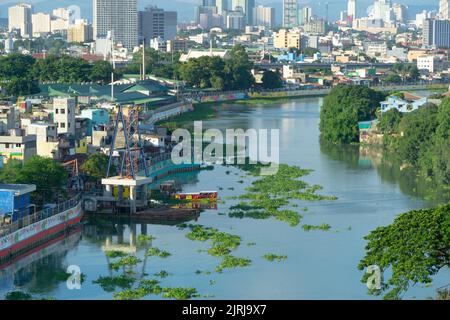 Boat crossing Pasig River, Manila, Philippines Stock Photo - Alamy