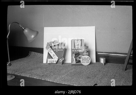 Wide view of two Selo film advertising posters leaning against white ...
