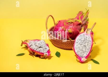Tropical Fruits Rattan Basket and Dragon fruits Stock Photo - Alamy