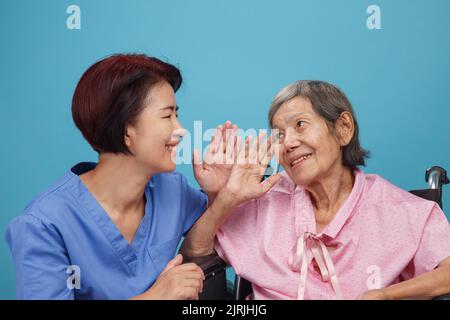 Asian seniors woman hearing loss , Hard of hearing Stock Photo - Alamy