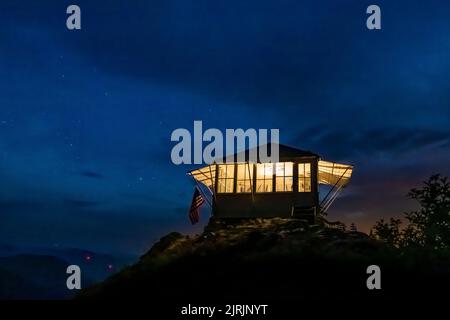 Twilight at Evergreen Mountain Lookout, with visitors renting the ...