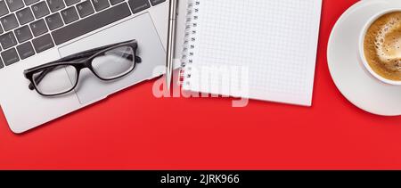 Office red workplace backdrop with supplies and computer. Flat lay ...