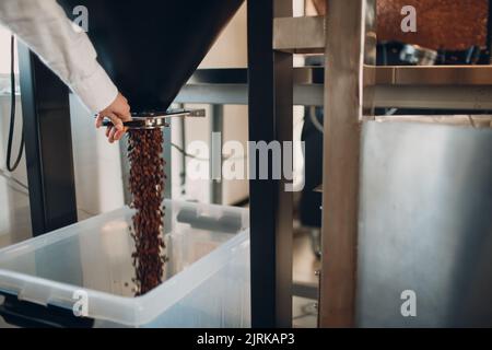 Coffee destoner machine at coffee roasting process Stock Photo - Alamy