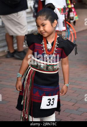 A young Native American girl (Navajo) waits her turn to compete in the ...