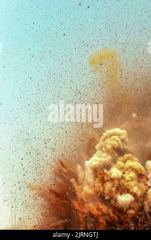 Rock and dust clouds during detonator blast on the mining site Stock ...