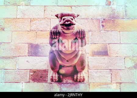 Antique stone gargoyle decorating a medieval stone wall Stock Photo - Alamy