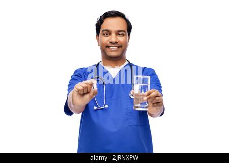 indian doctor with medicine and glass of water Stock Photo - Alamy