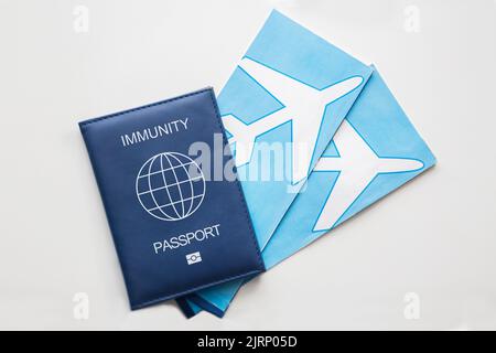 immunity passport and air tickets for travel Stock Photo - Alamy