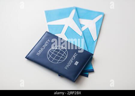 immunity passport and air tickets for travel Stock Photo - Alamy
