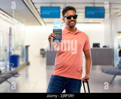 happy man with air ticket and immunity passport Stock Photo - Alamy