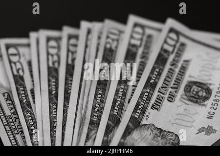 A grayscale shot of United States Dollars banknotes bills Stock Photo ...