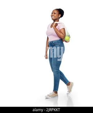 african woman with food in reusable string bag Stock Photo - Alamy
