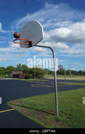 Basketball hoop at a grade school playground Stock Photo - Alamy