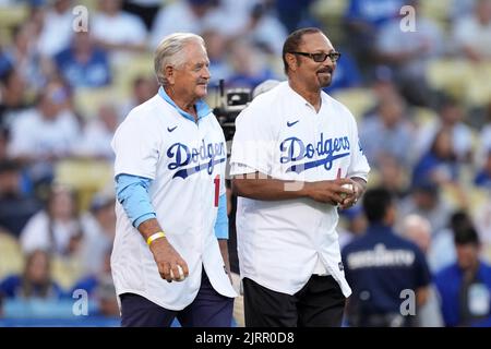 Rick Dempsey (left) and Ken Landreaux prepare to throw out the ...